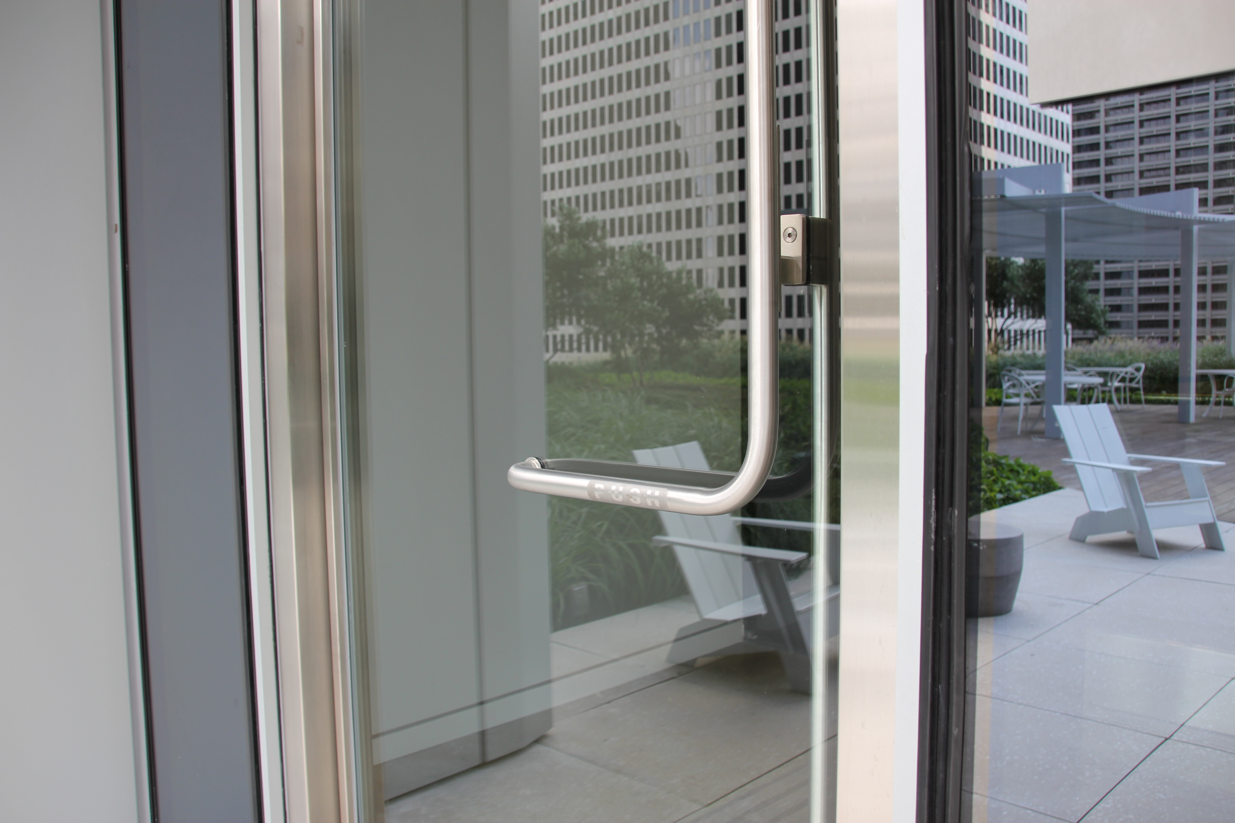 Bank of America Tower | Ellison Bronze - Custom Crafted Balanced Doors